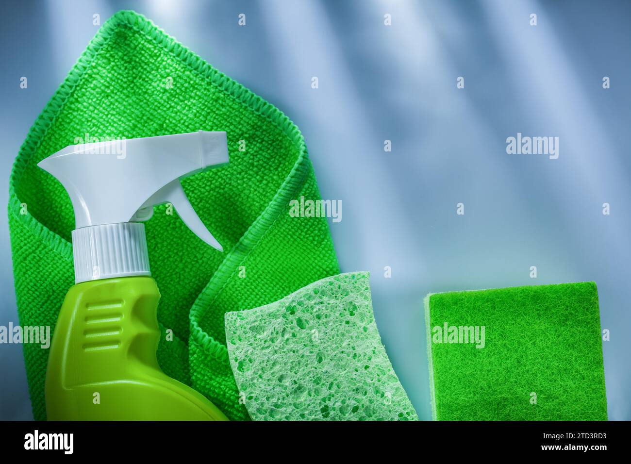 Green cleaning cloth sprayer sponge on white background Stock Photo - Alamy