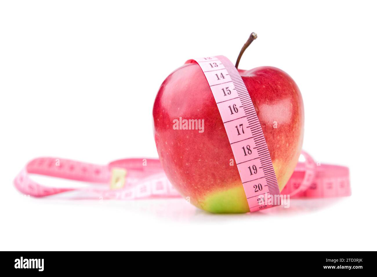 Apple and measuring tape isolated Stock Photo - Alamy