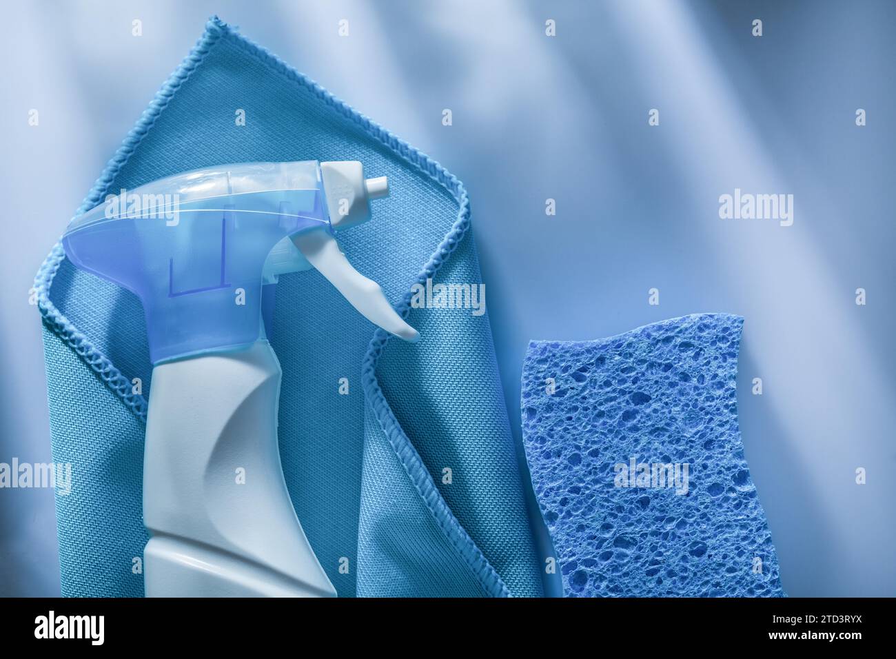 Blue washing rag sprayer sponge on white background Stock Photo - Alamy