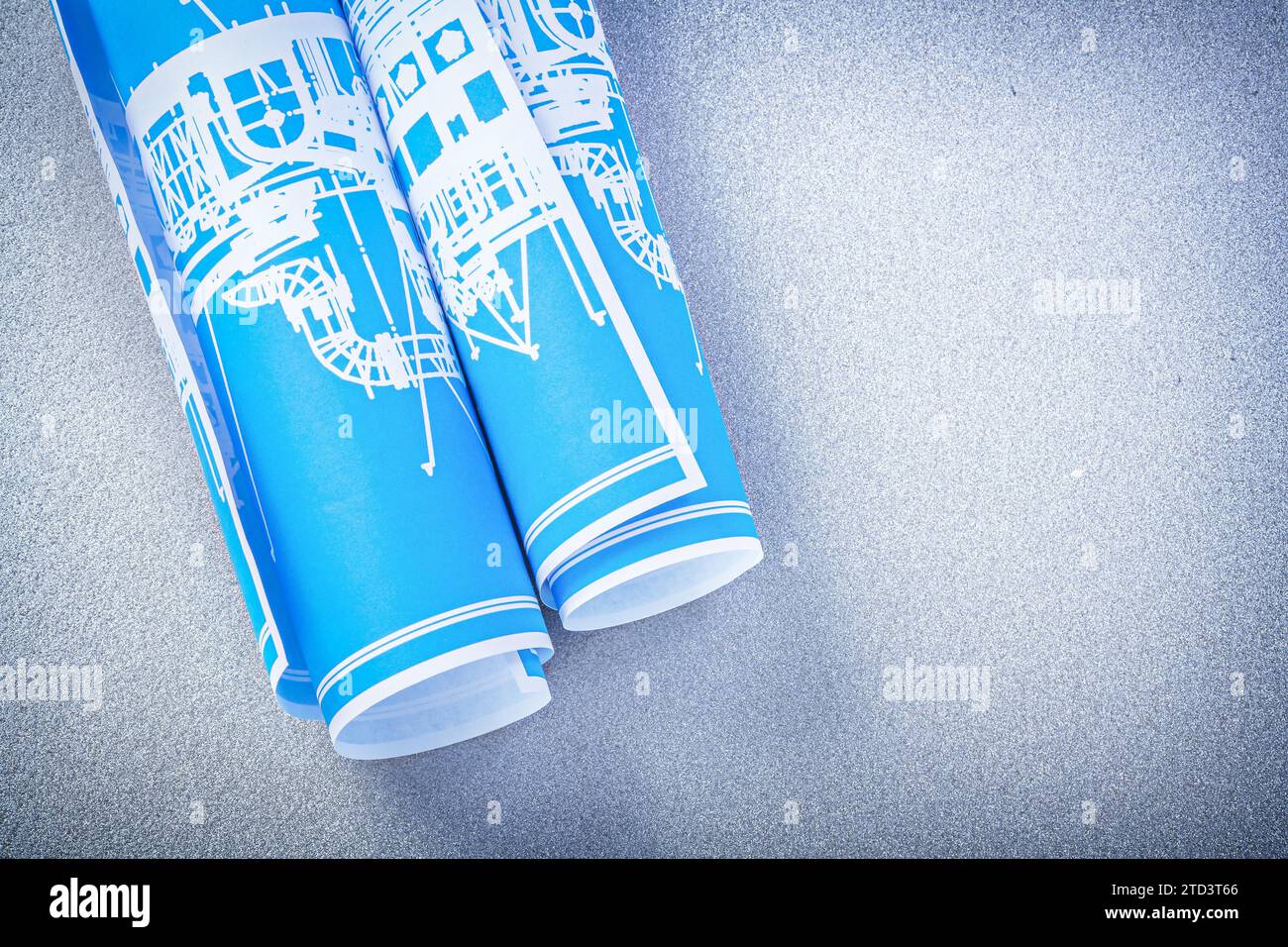 Blue engineering drawings on grey surface construction concept Stock ...