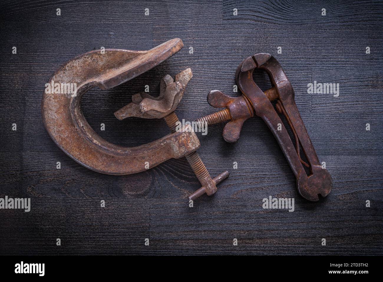 Horizontal view of two old staples on an old wooden board Stock Photo ...