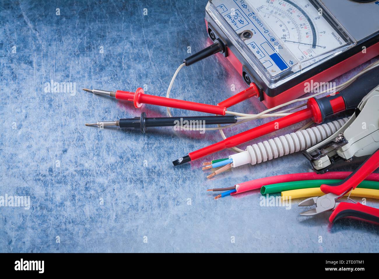 Composition of electrical articles on a metallic background, close-up ...