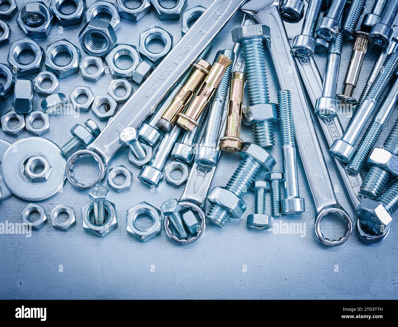 Large set of stainless steel repair tools on metallic background ...