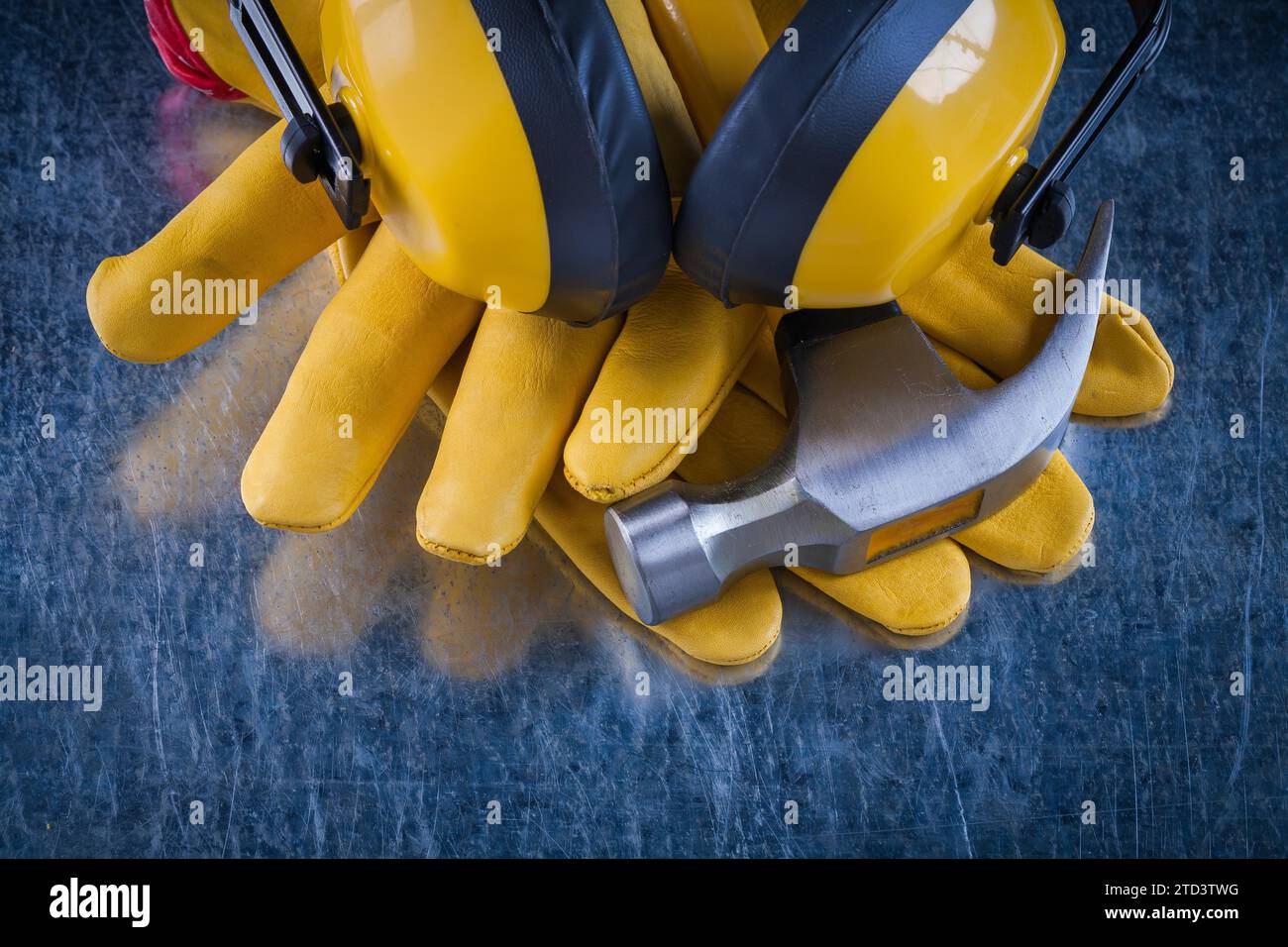 Collection of protective workwear on scratched metallic background ...