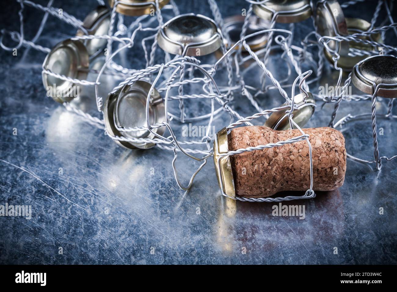 Pile of twisted metal cork stoppers food drink concept Stock Photo - Alamy