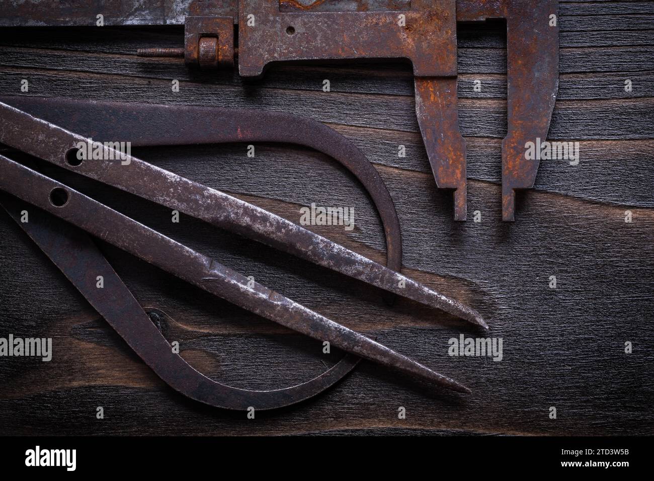 Grunge messy rusted brake calipers on vintage wood background Stock ...