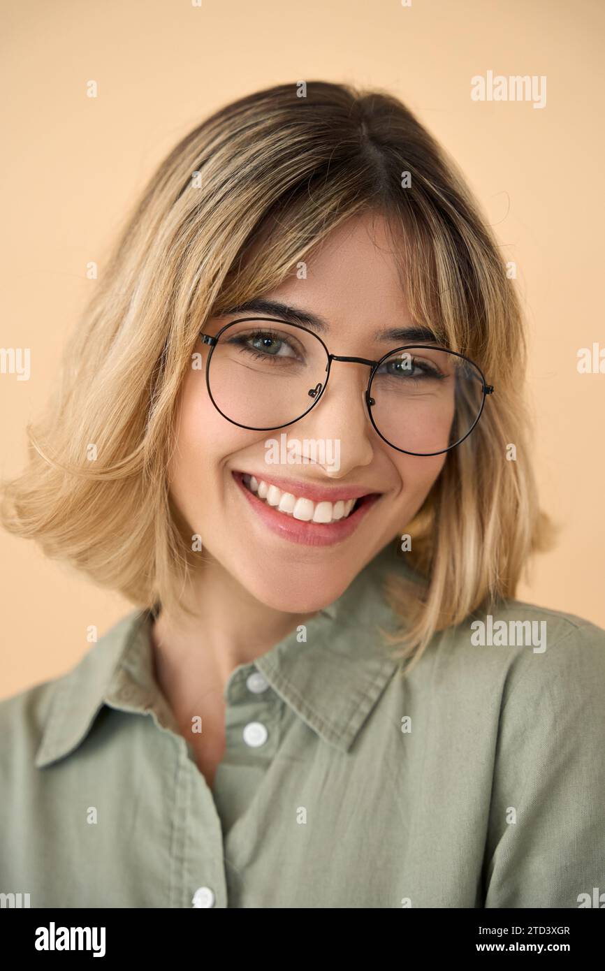 Happy gen z blonde student girl with short blond hair wearing glasses ...
