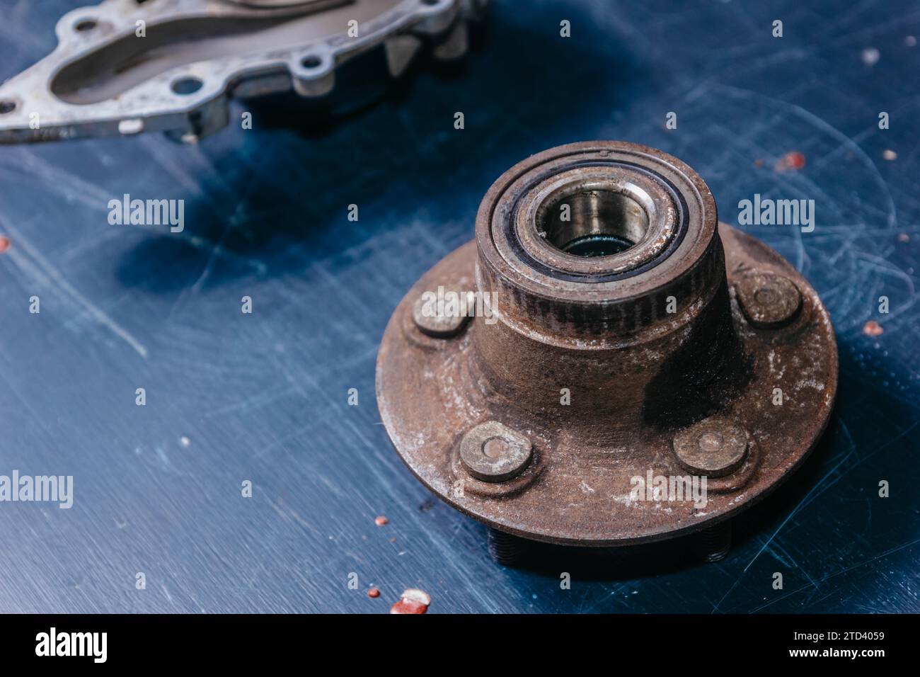 Rust used wheel hub, used auto parts recycling concept Stock Photo - Alamy
