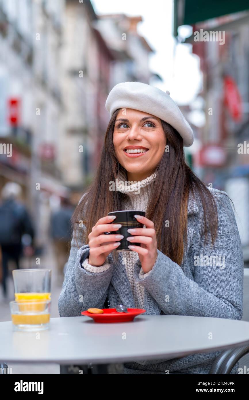Woman drinking hot coffee in hi-res stock photography and images - Alamy