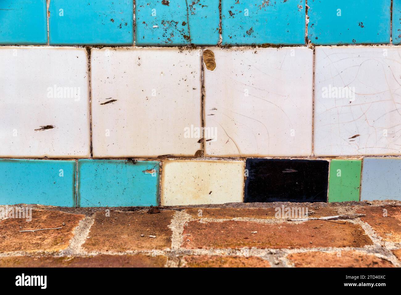 Broken wall in a swimming pool, cracks, wall tiles, dilapidated ...