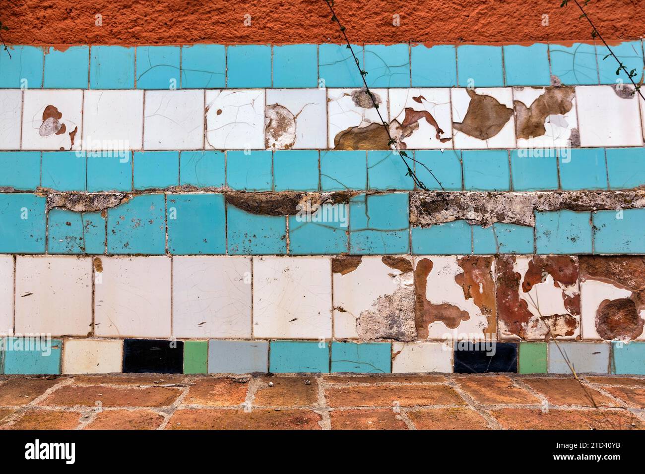 Broken wall in a swimming pool, cracks, wall tiles, dilapidated ...