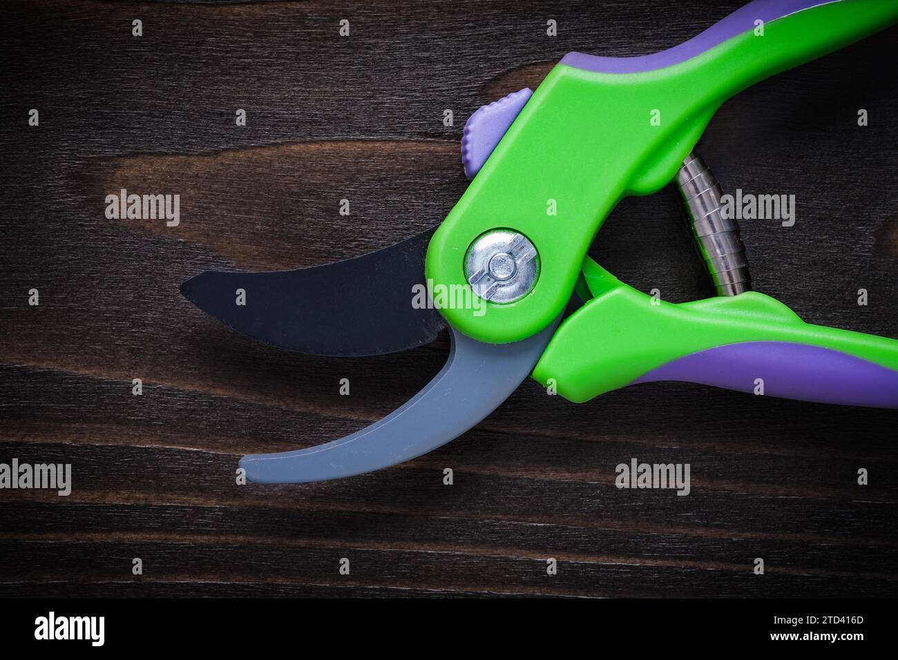 Metal secateurs on vintage wood background agricultural concept Stock ...