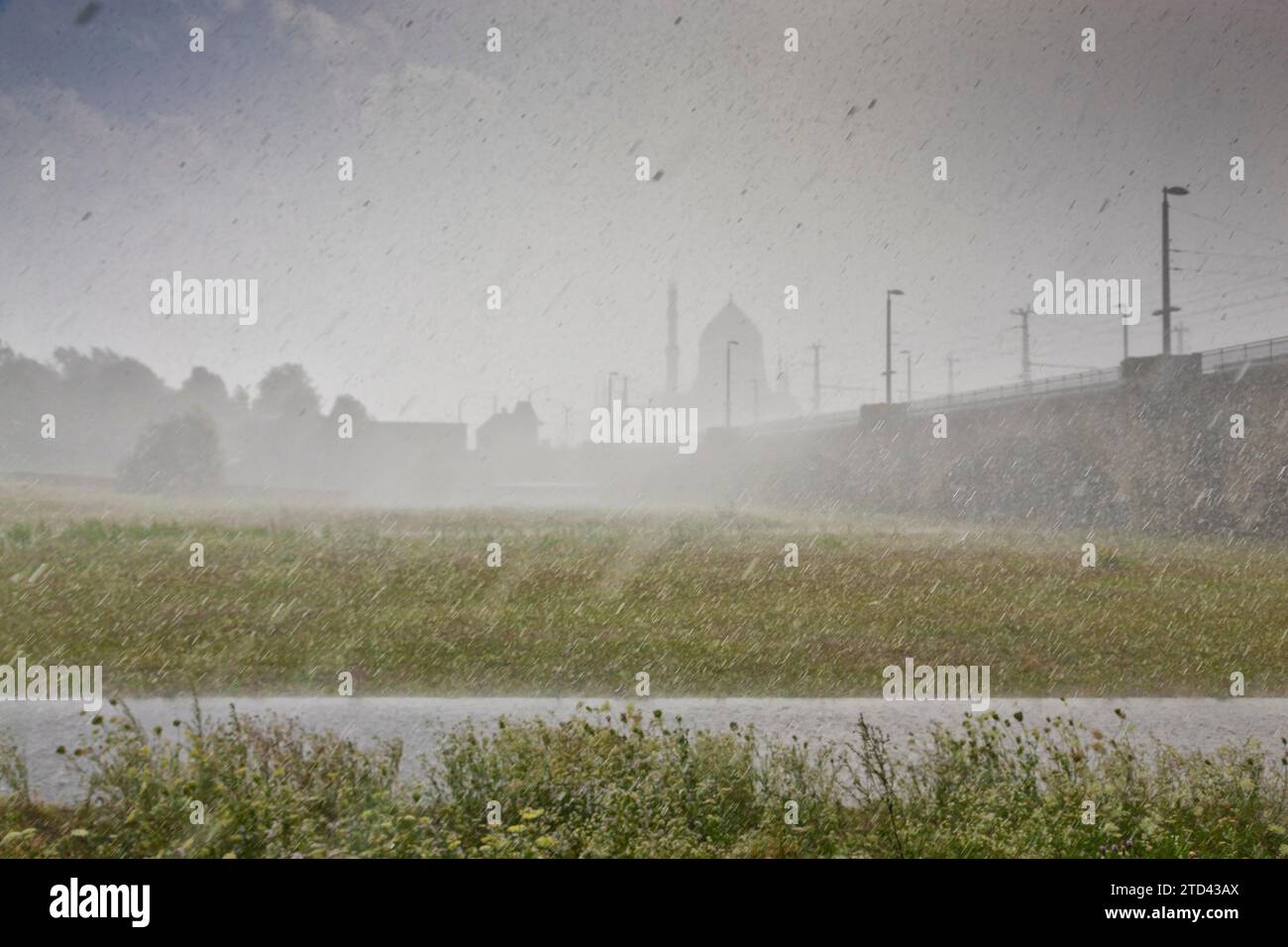 Rain over town hi-res stock photography and images - Alamy
