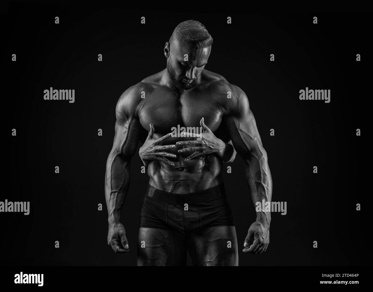 Perfect abdomen. Female hands embracing, touching muscular man abs ...