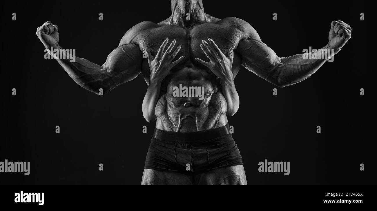 Perfect abdomen. Female hands embracing, touching muscular man abs ...