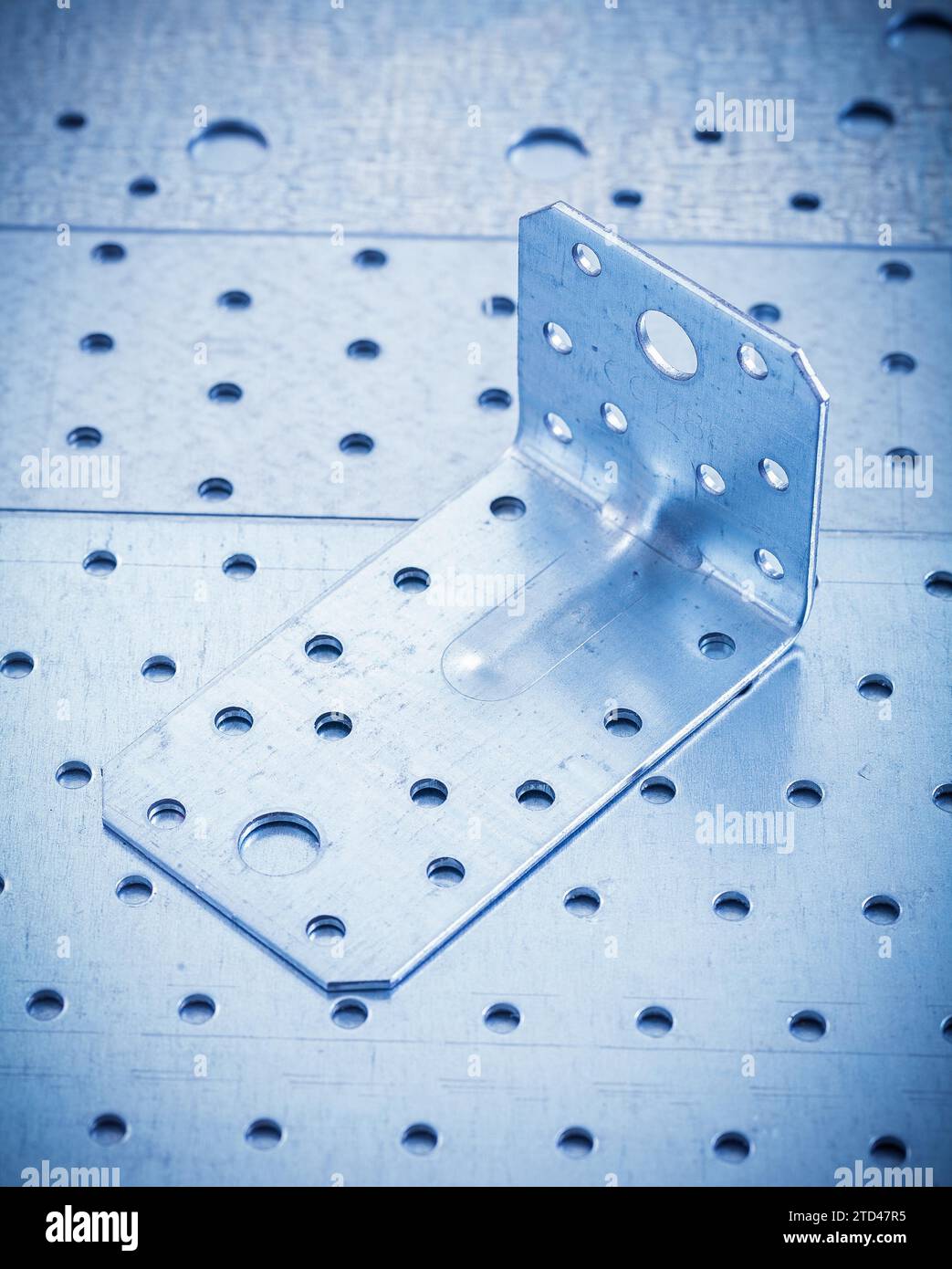 Stainless steel angle iron construction concept on perforated sheet ...