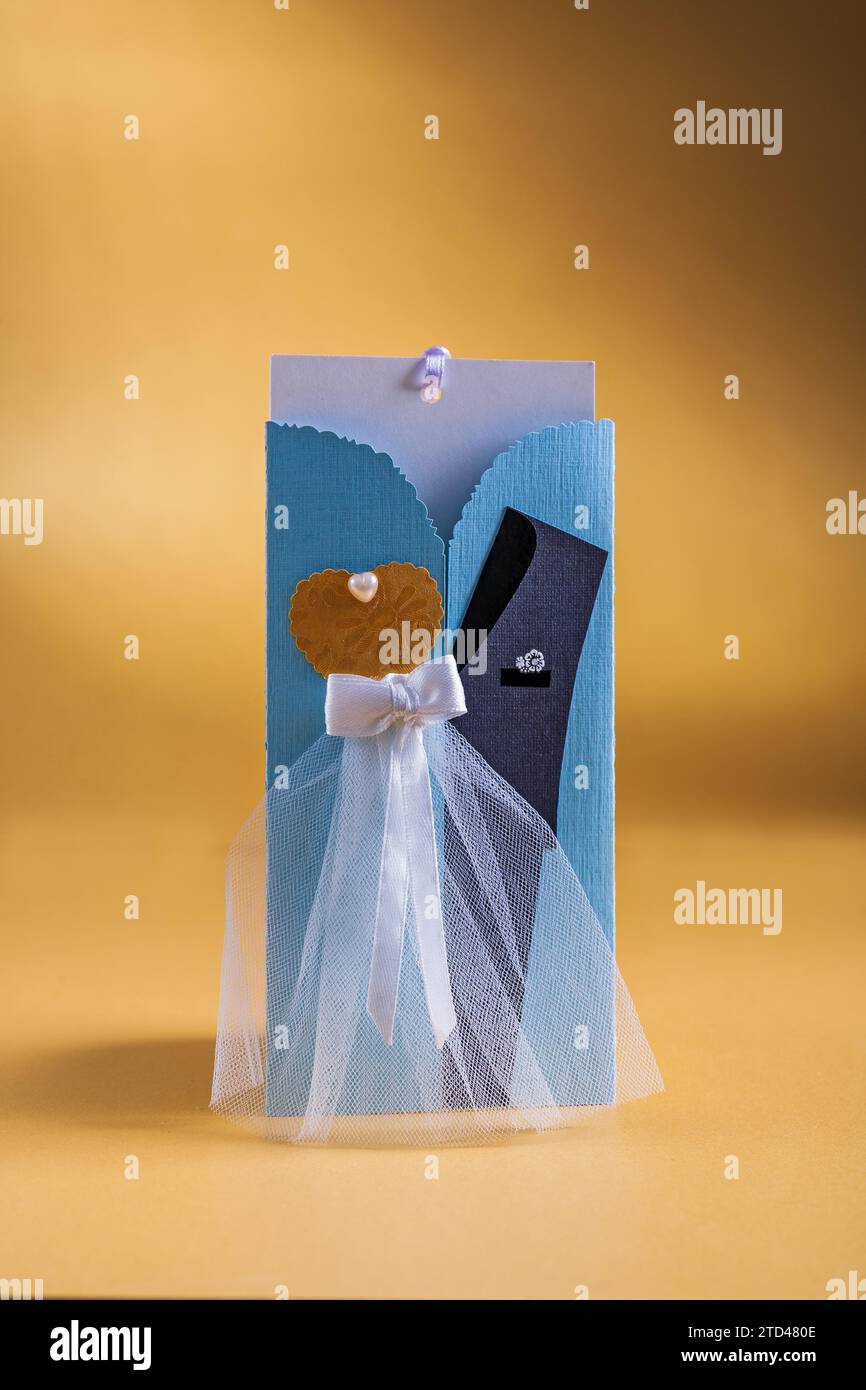 Wedding invitation card on yellow background 1 Stock Photo - Alamy