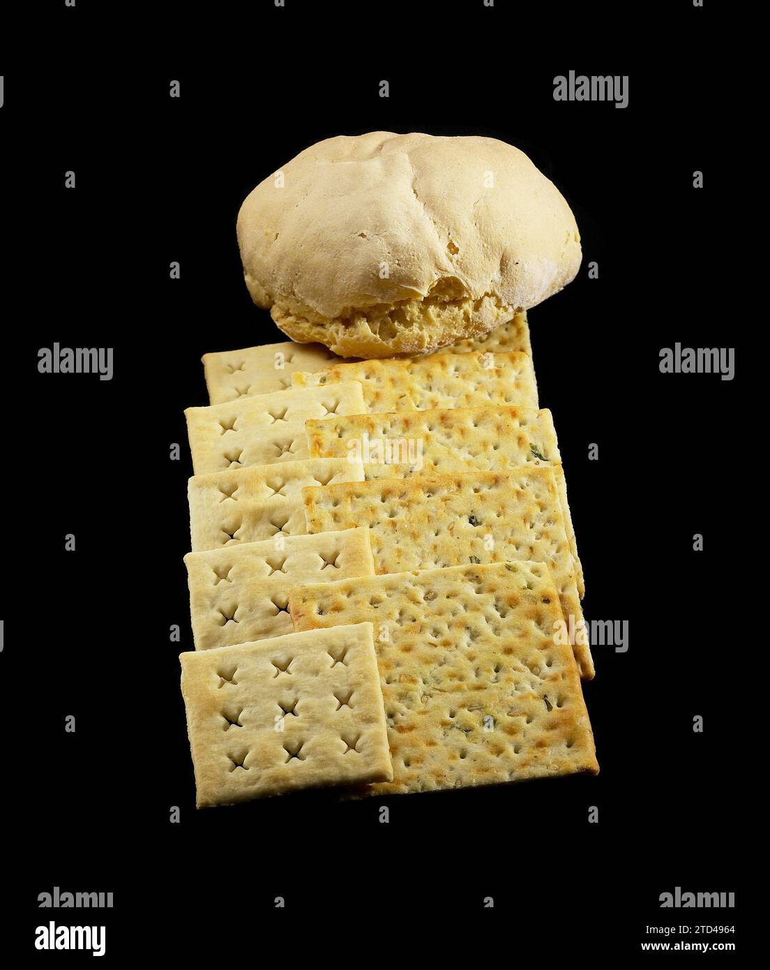 Fresh bread and crackers on black background Stock Photo - Alamy