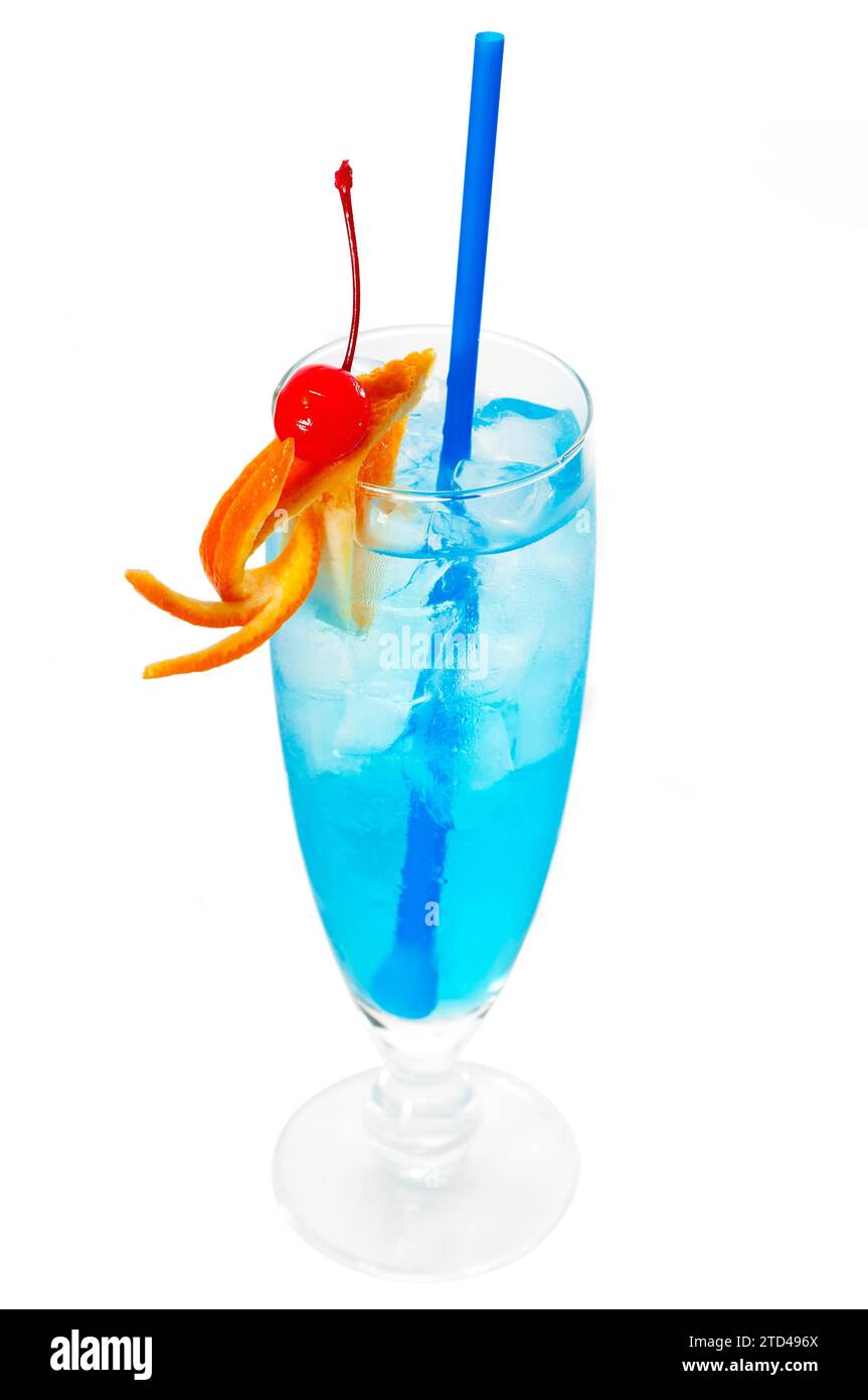 Blue long drink cocktail with orange and cherry garnish and blue straw ...