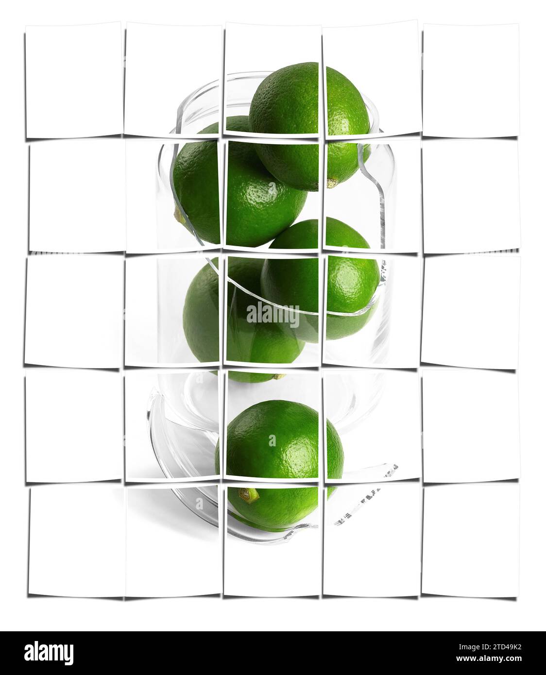 Shattered glass jar with lime on white background Stock Photo - Alamy