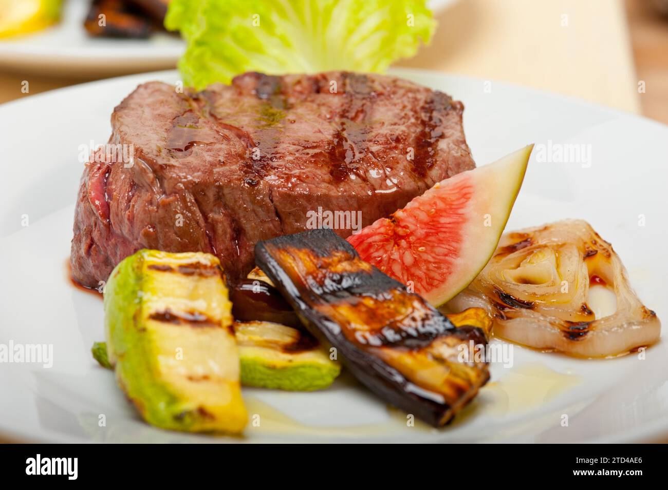 Grilled fresh beef filet mignon and vegetables Stock Photo - Alamy