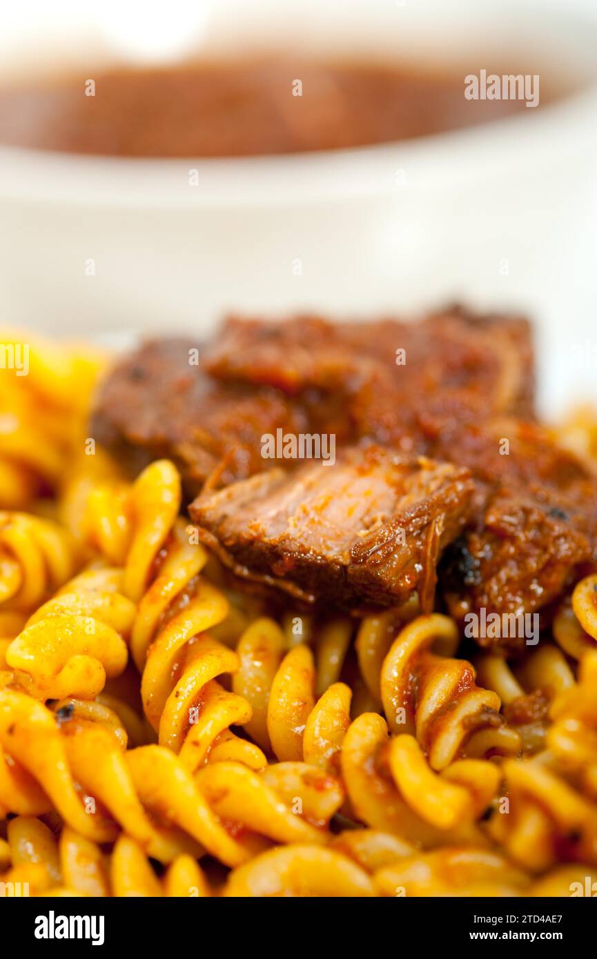 Fusilli pasta al dente with neapolitan style ragu meat sauce very ...