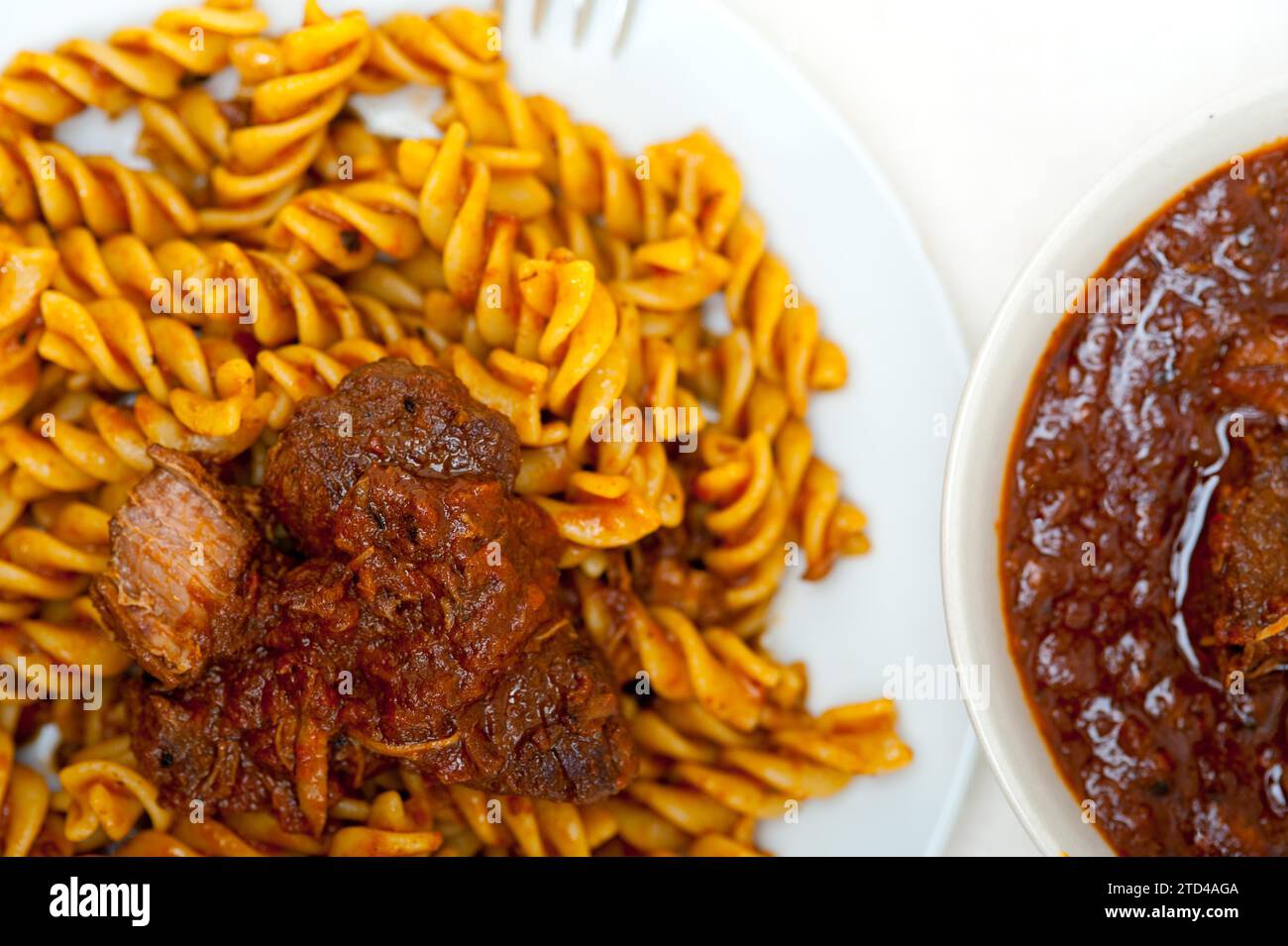 Fusilli pasta al dente with neapolitan style ragu meat sauce very ...