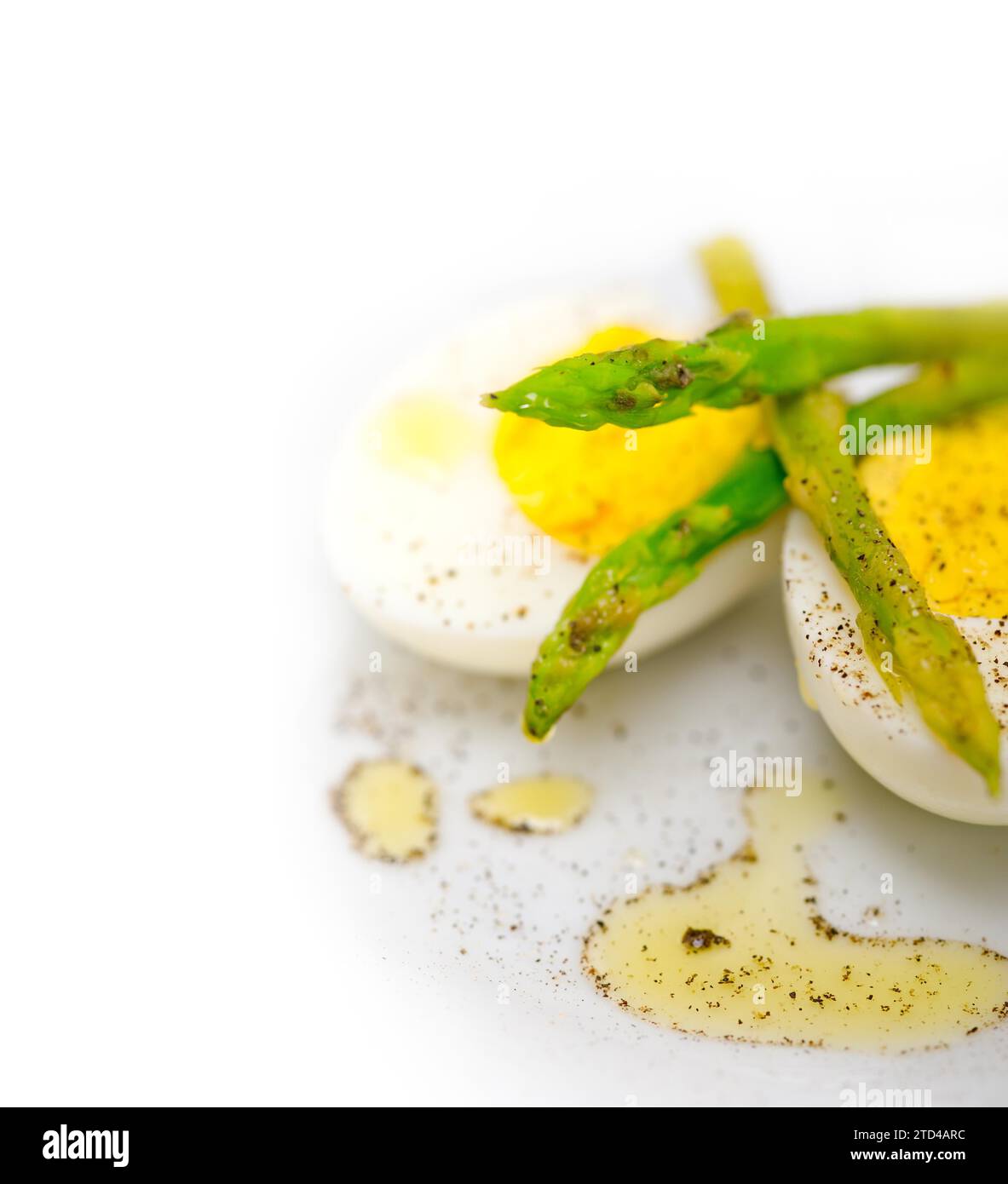 Boiled fresh green asparagus and eggs with extra virgin olive oil, food ...