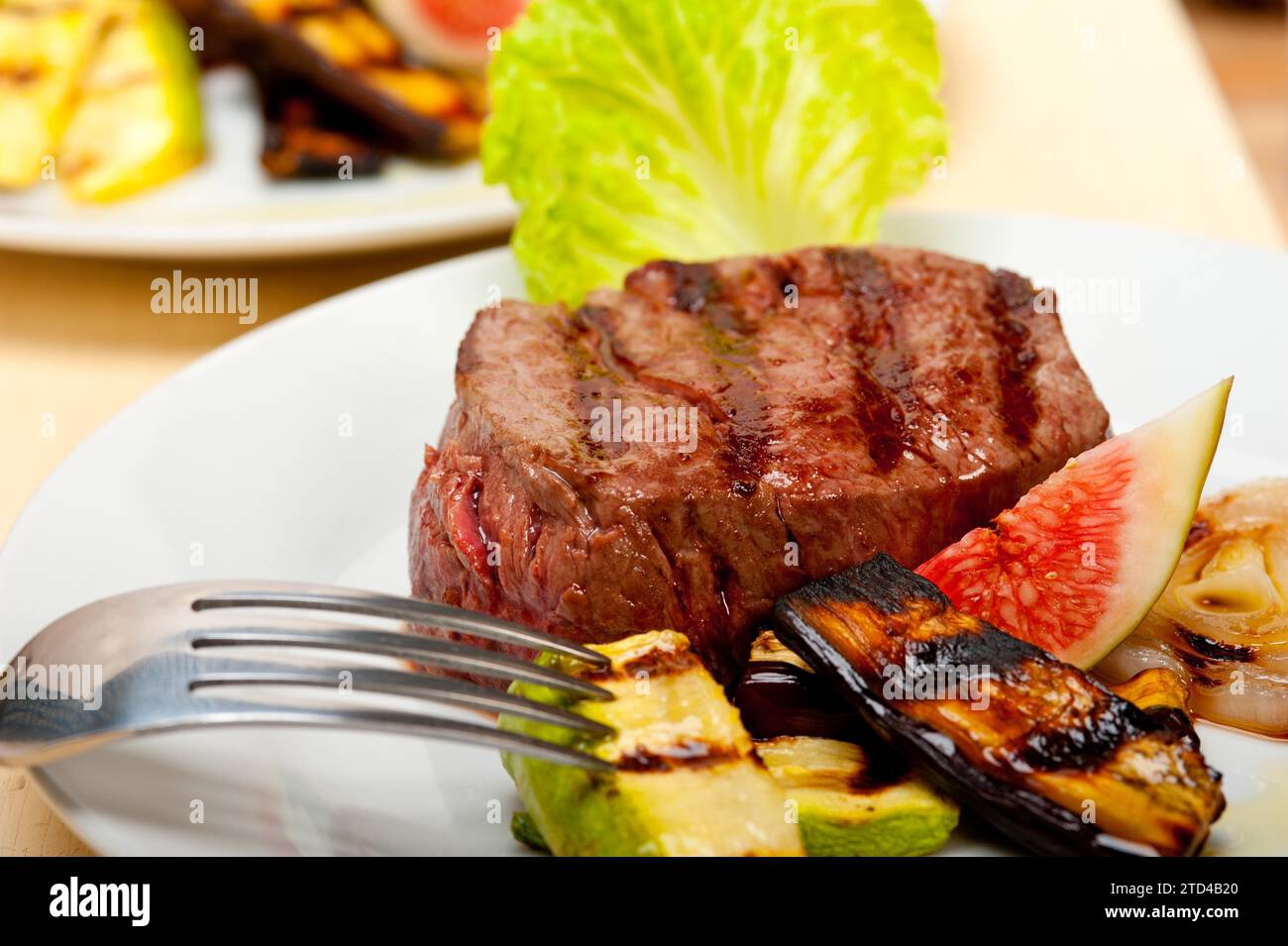 Grilled fresh beef filet mignon and vegetables Stock Photo - Alamy