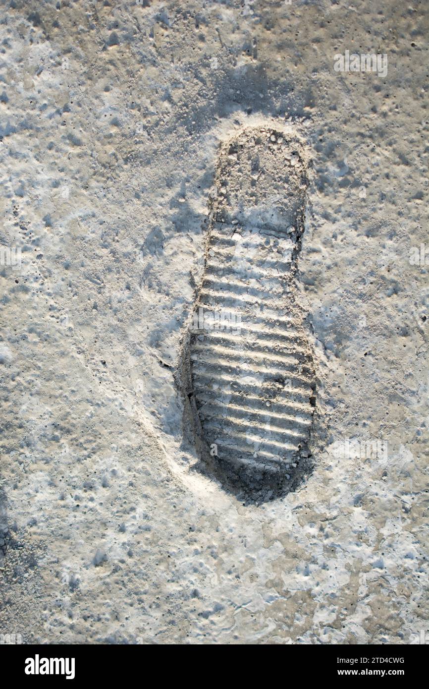 Footstep pattern seen on a concrete background Stock Photo - Alamy