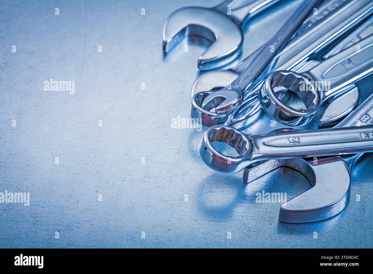 Vertical view of flat spanners and open-end spanners on a metallic ...