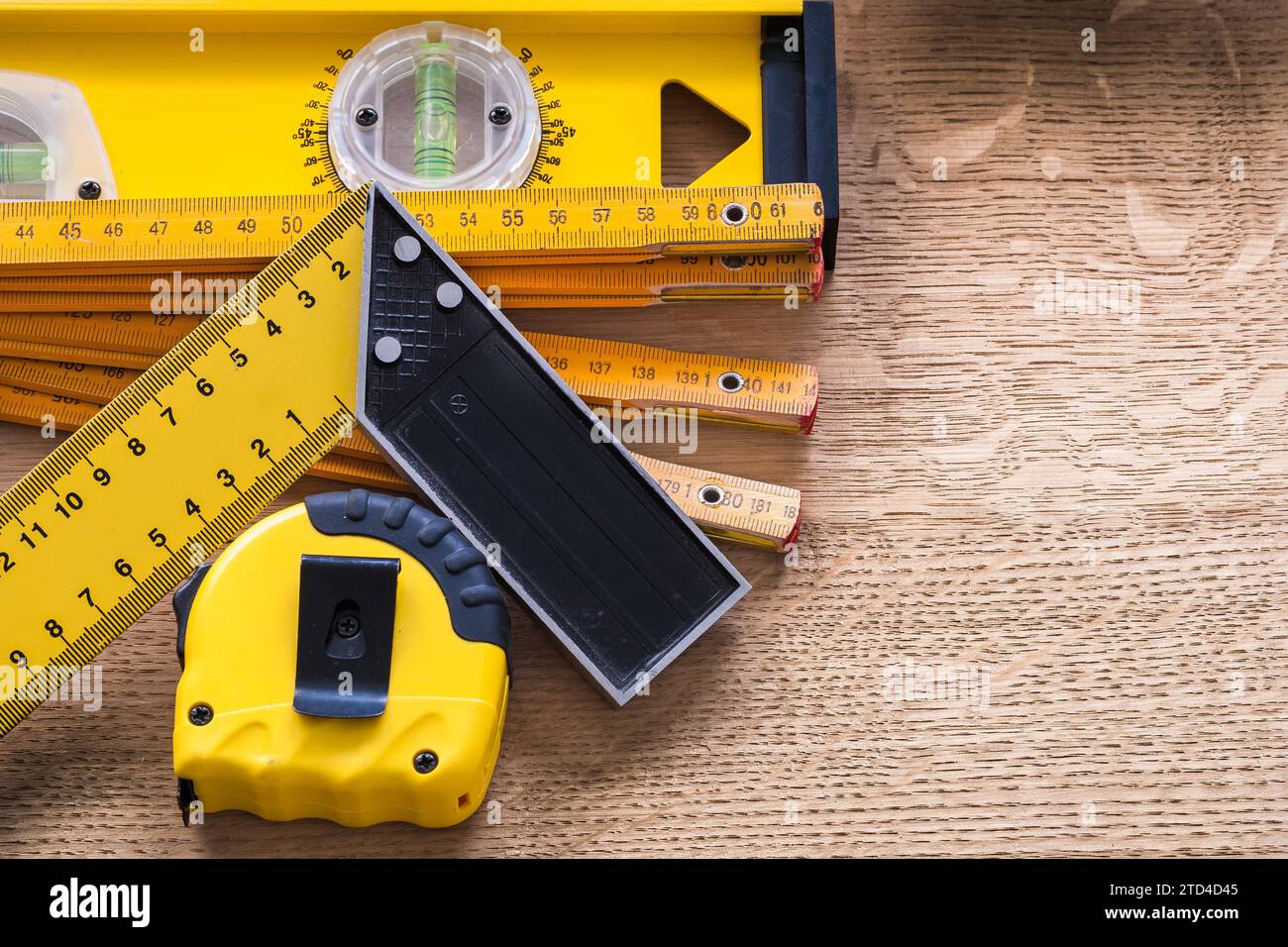 Wooden oak panel with measuring objects Design concept Stock Photo - Alamy
