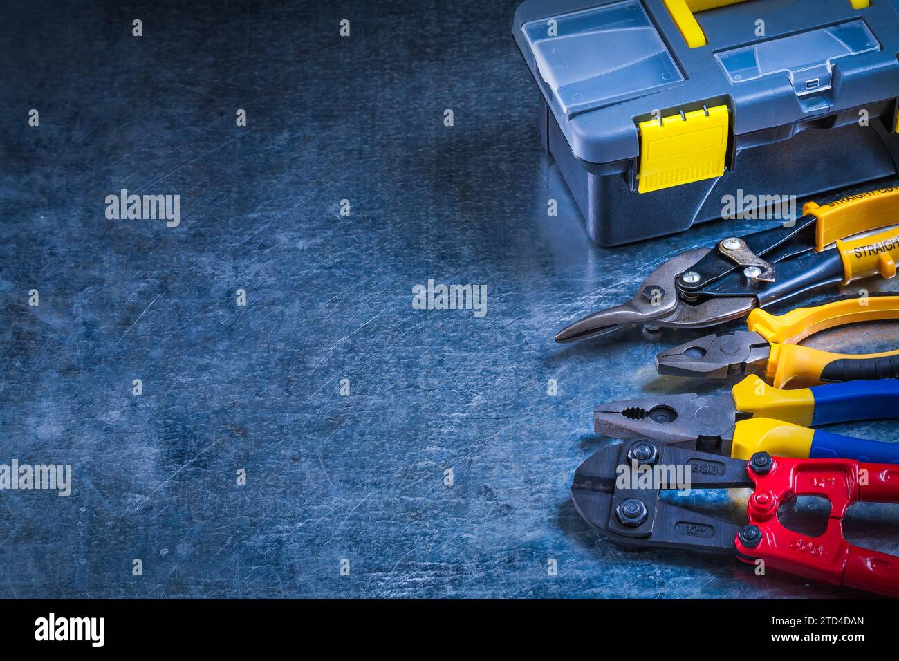 Copy space image of toolbox bolt cutter pliers and tin snips on ...