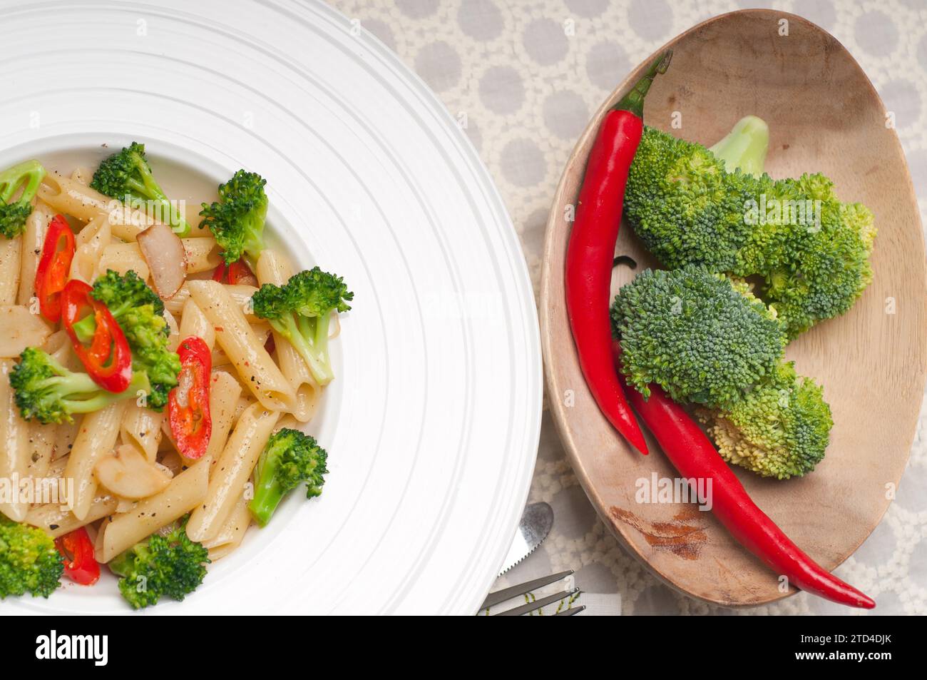 Classic Italian penne pasta with broccoli and red chili pepper Stock ...