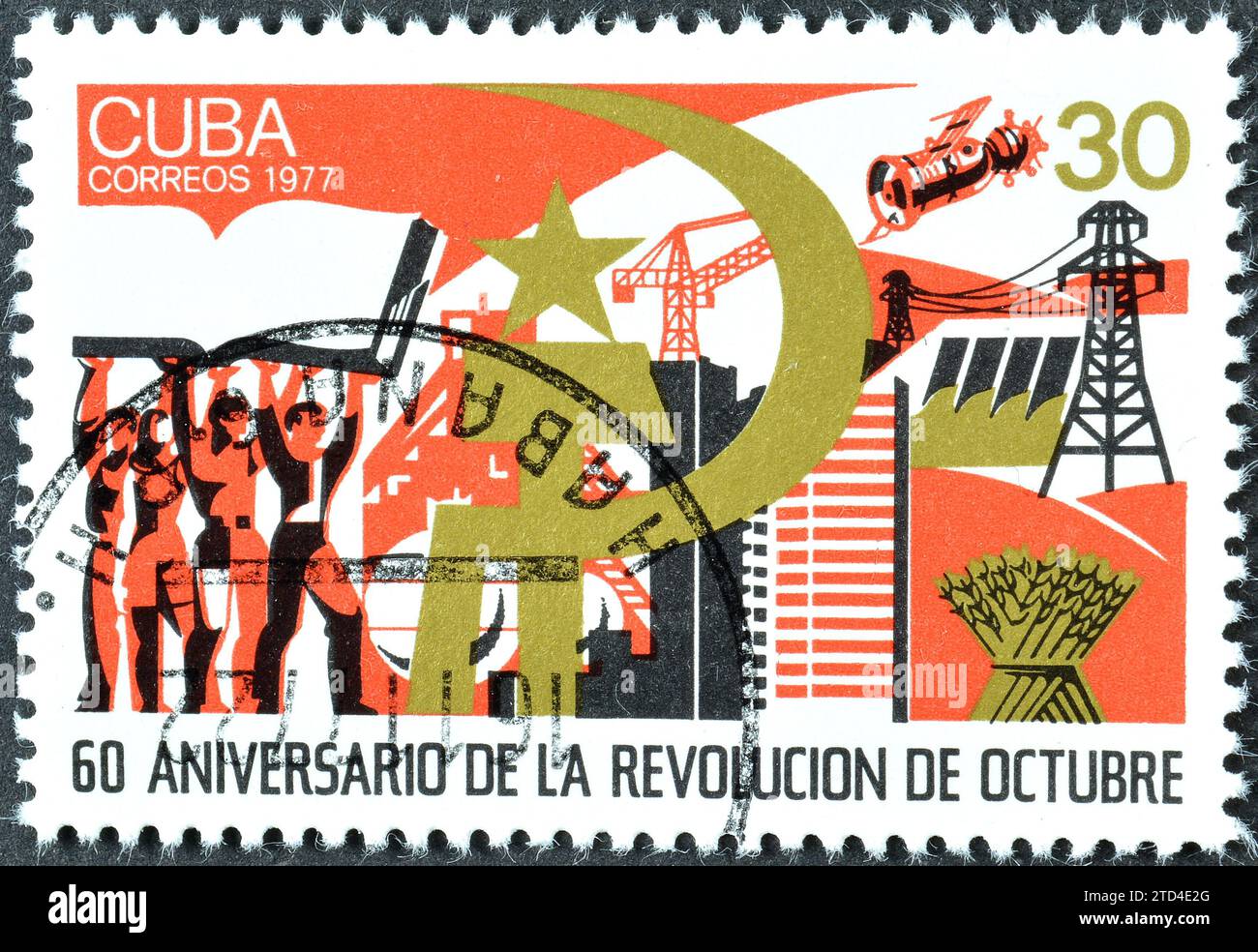 Cancelled postage stamp printed by Cuba, that shows Hammer, sickle ...