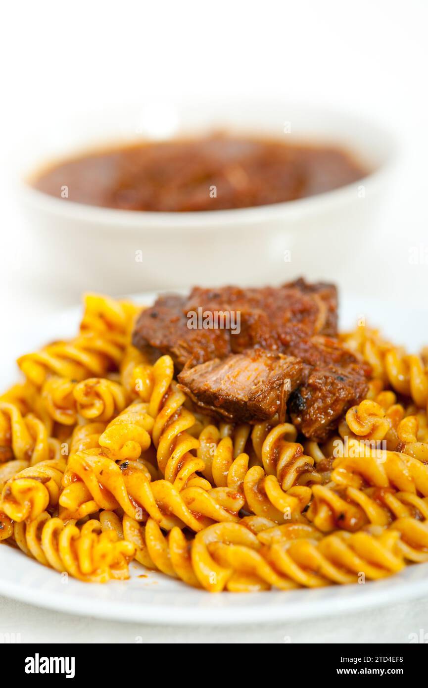 Fusilli pasta al dente with neapolitan style ragu meat sauce very ...