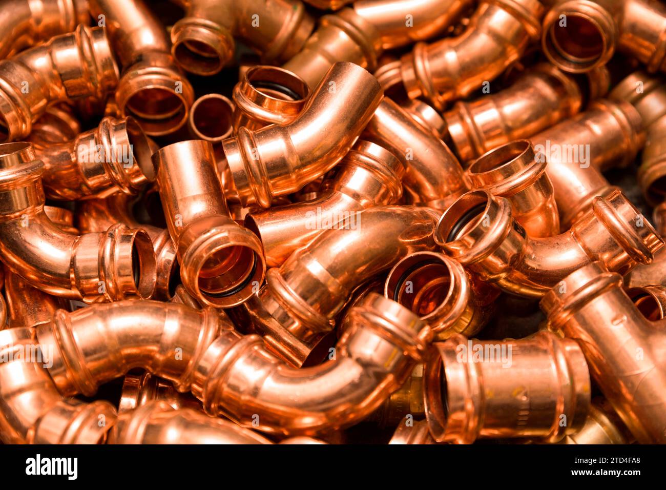 Copper tubes, press bends Stock Photo - Alamy