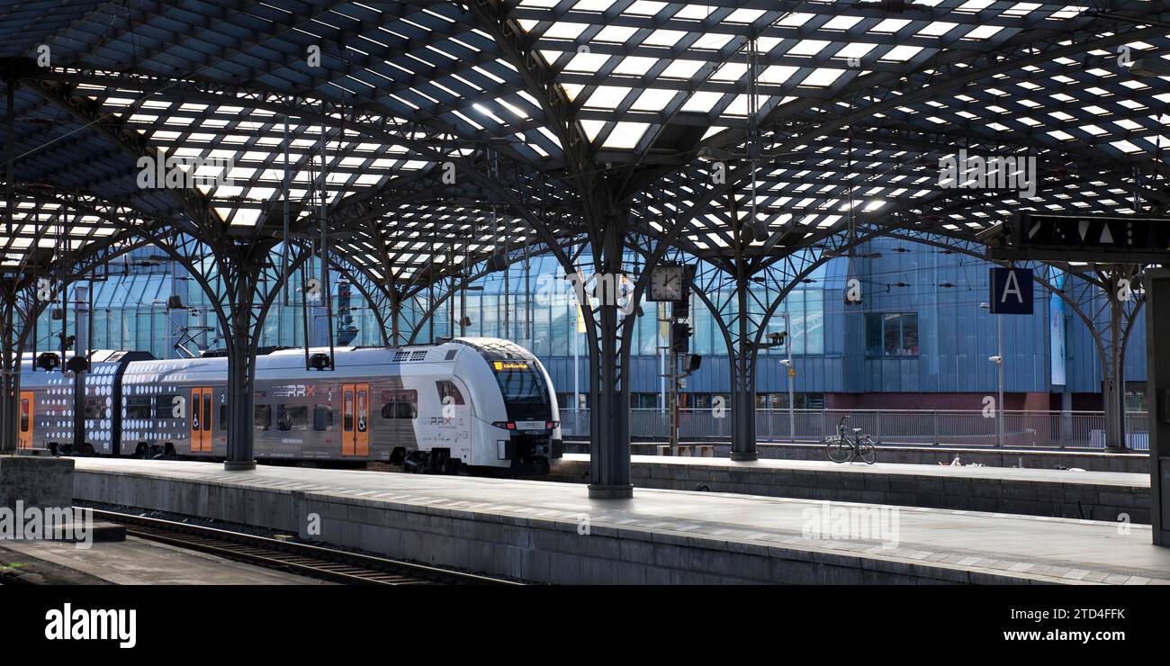 Local train with platform roofing at Cologne Central Station, Rhineland ...