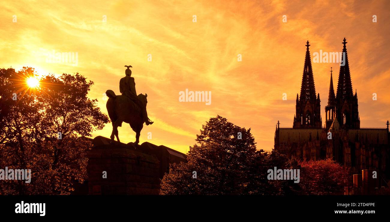 Equestrian statue of Kaiser Wilhelm II backlit with the silhouette of ...