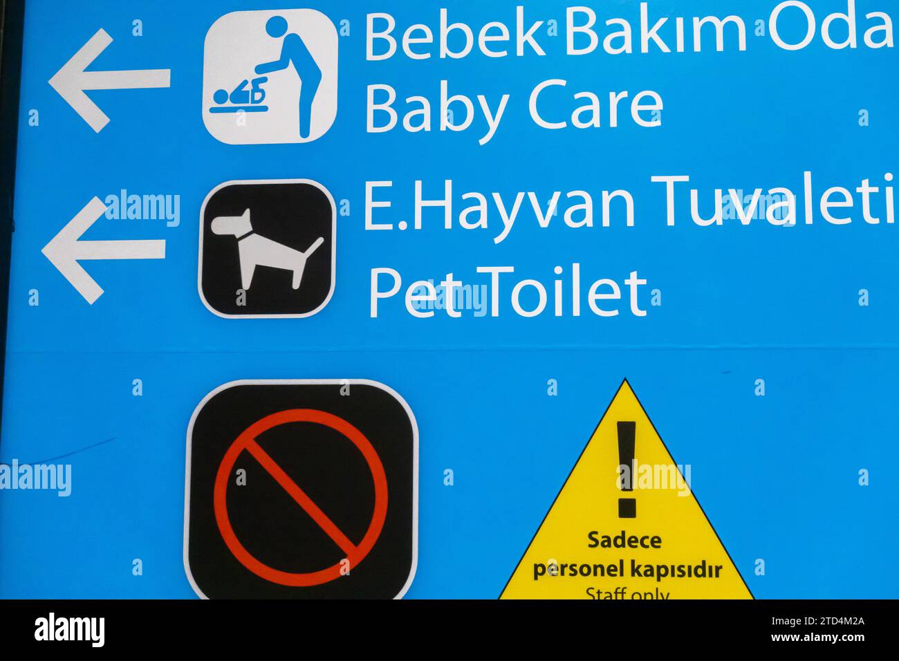 Baby care and pet toilet directional signs, bilingual sign in IST ...