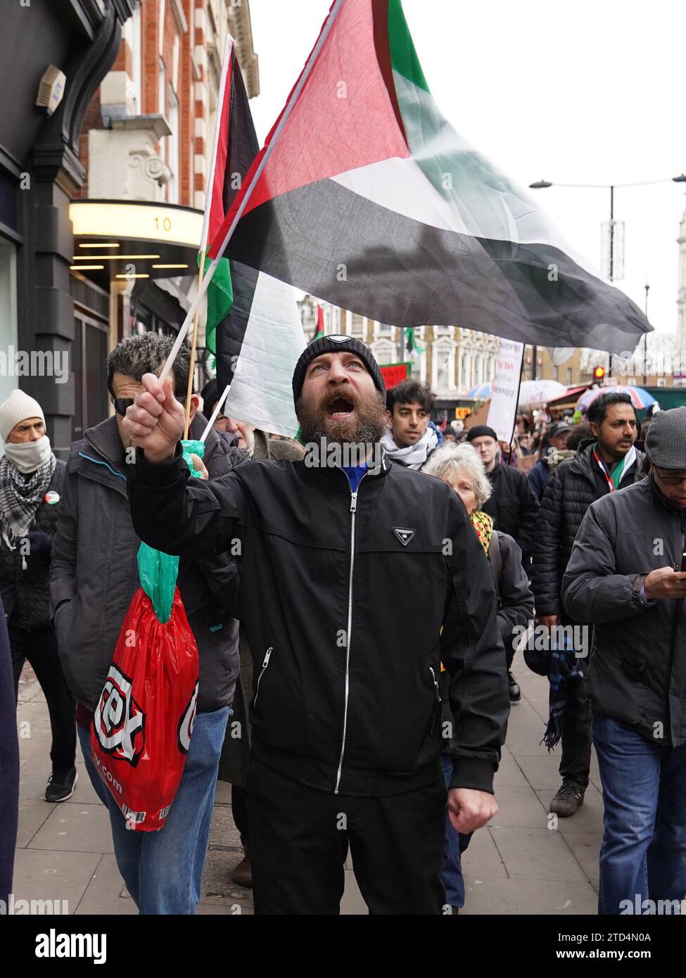People take part in a protest as part of the Stop the War Coalition's ...