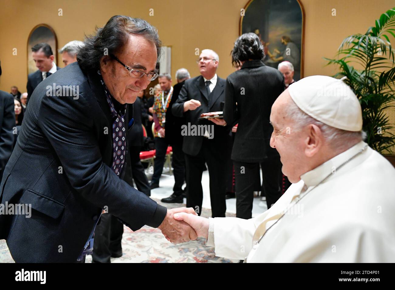 Vatican City, Vatican. 16th Dec 2023. Pope Francis shakes hands with ...