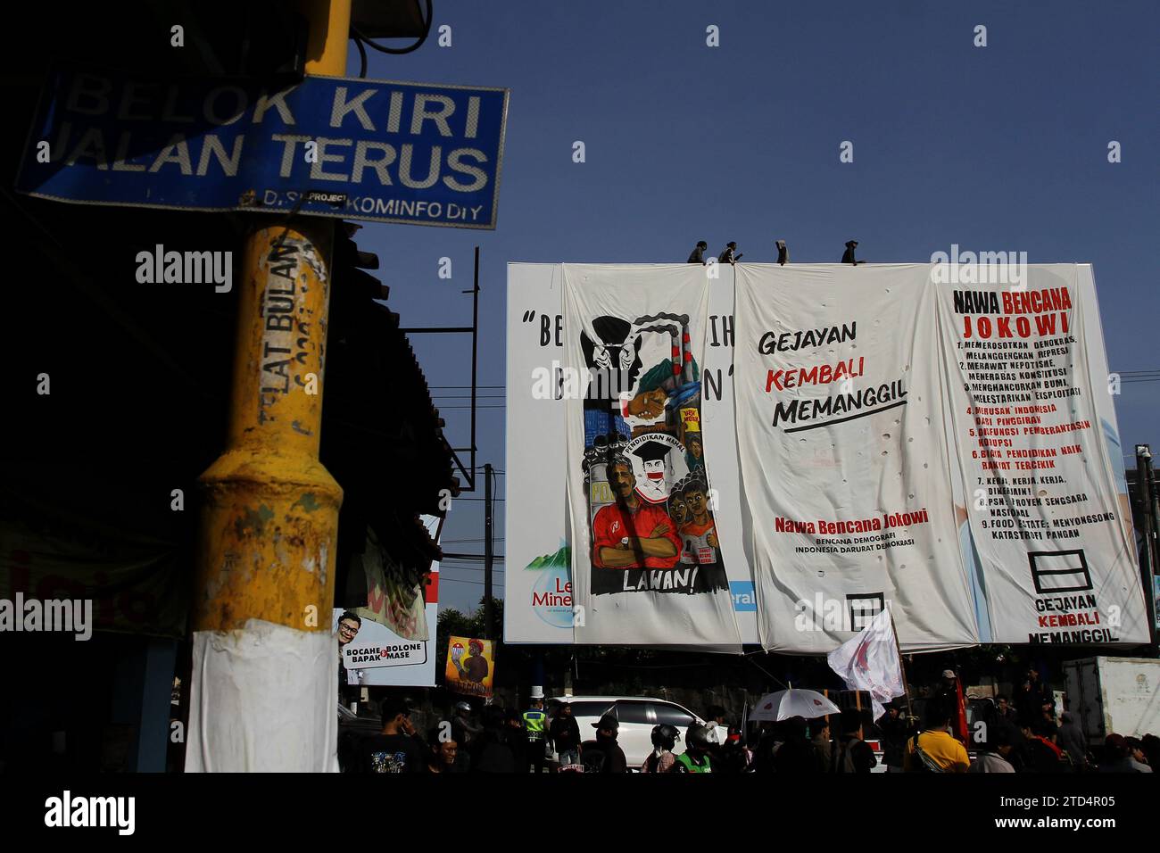 Yogyakarta, Indonesia. 16th Dec 2023. Demonstrators display giant ...