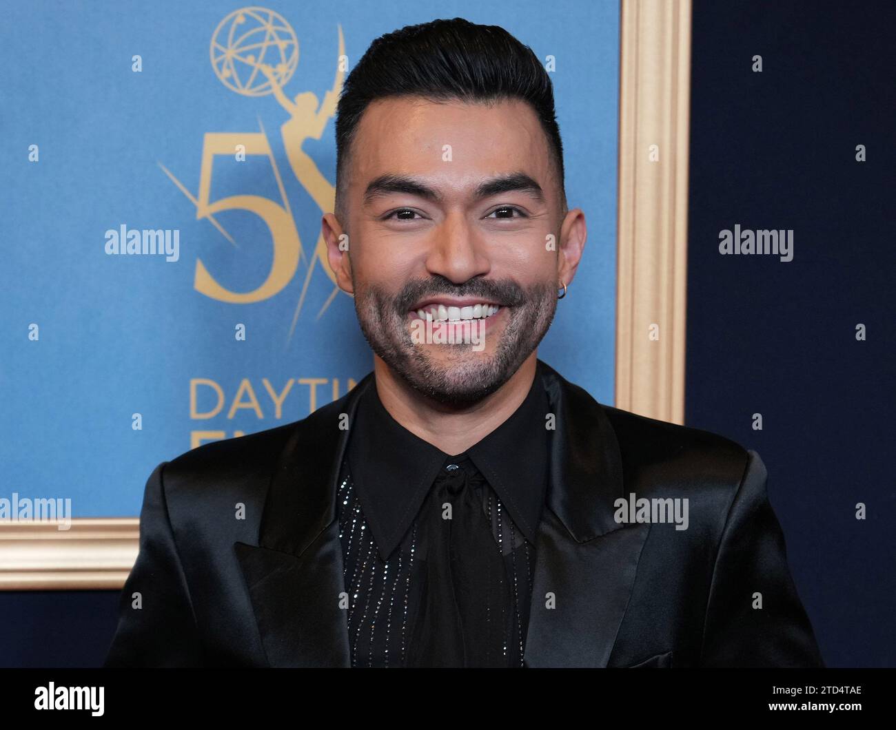 Denny Directo arrives at the 50th Annual Daytime Emmy Awards held at ...