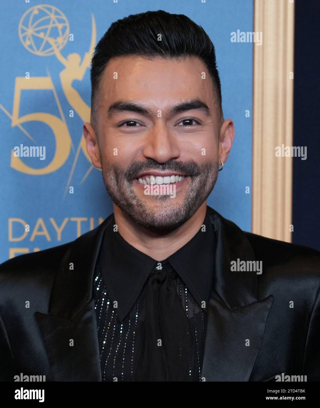 Denny Directo arrives at the 50th Annual Daytime Emmy Awards held at ...