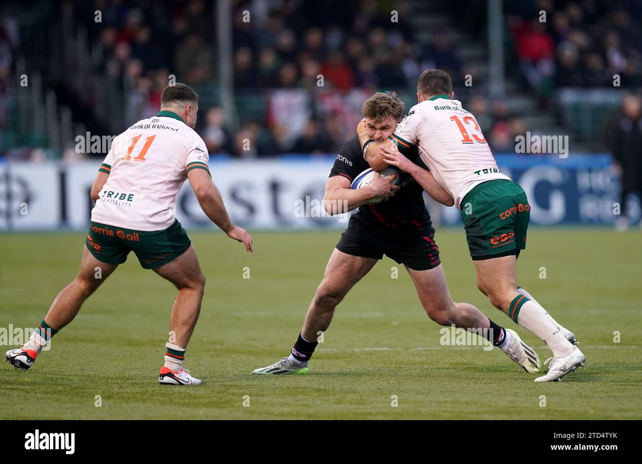 Saracens' Olly Hartley is tackled by Connacht's Tom Farrell (right ...