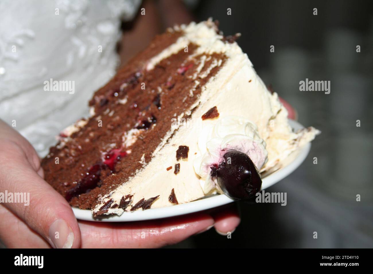 Big cake, hand hi-res stock photography and images - Alamy