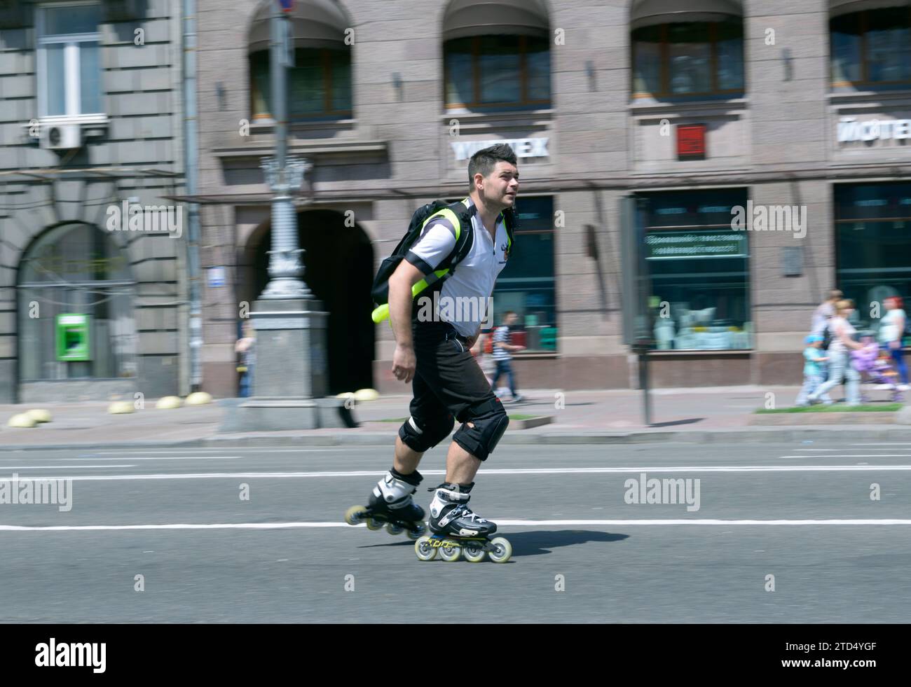 Active man on roller skates hi-res stock photography and images - Alamy