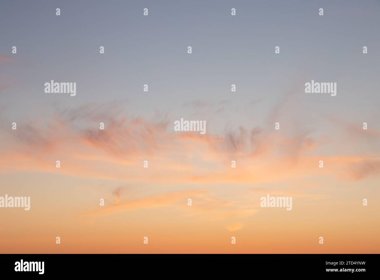 Colourful sky during sunset with reddish hues. Blue, orange and golden ...