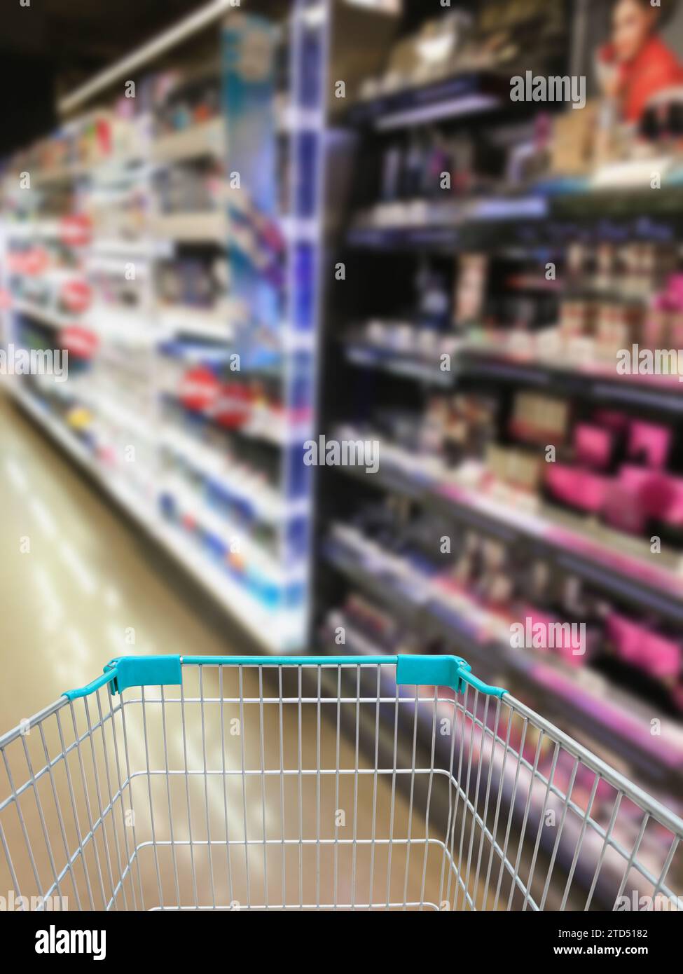 View of a shopping cart and aisle at supermarket Stock Photo - Alamy